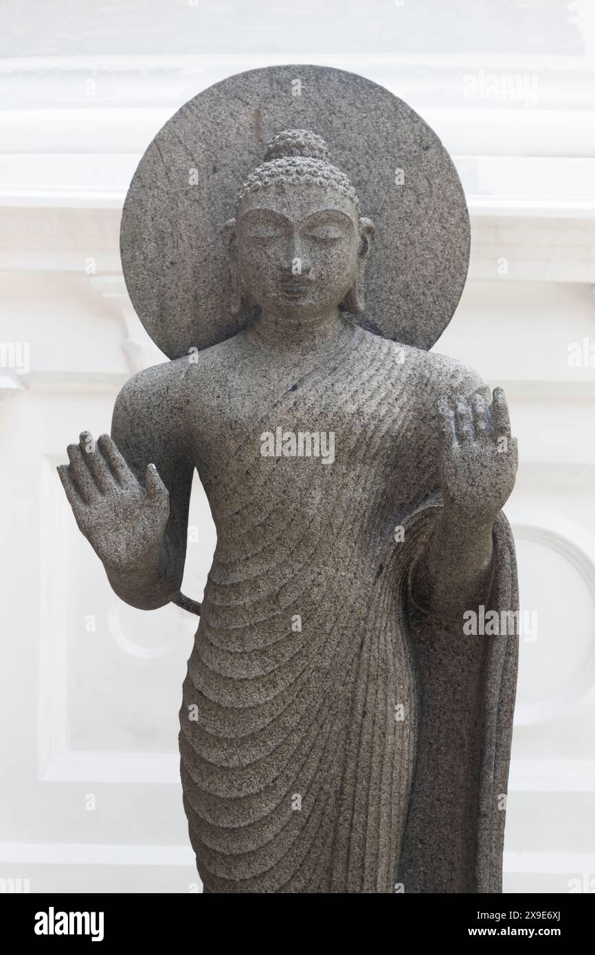 Ancient Buddha statue made of stone. Gangaramaya Temple, the most ...