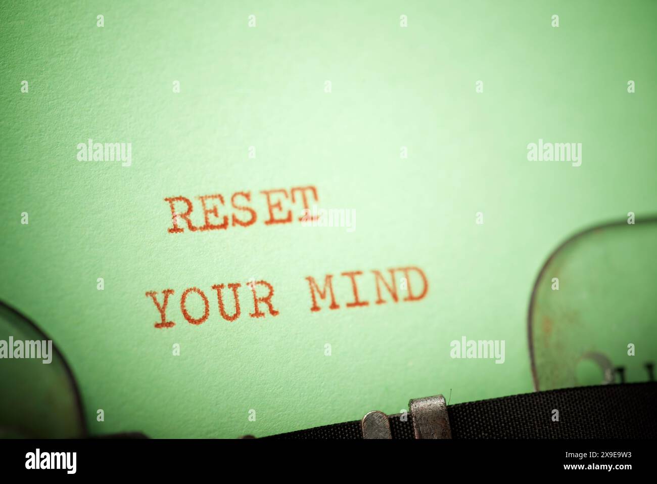 Reset your mind text written with a typewriter Stock Photo - Alamy