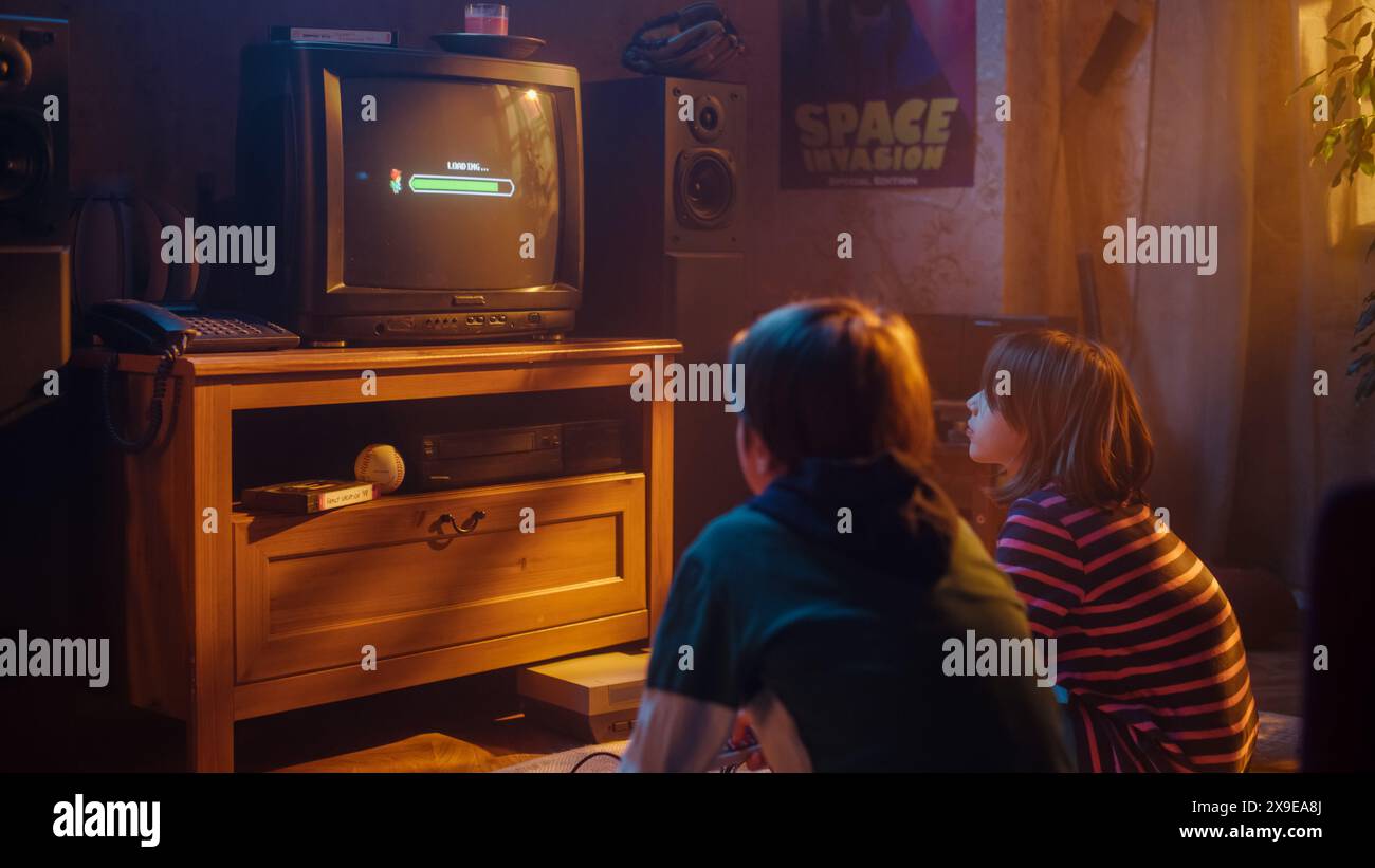 Nostalgic Childhood Concept: Young Boy and Girl Playing Old-School ...