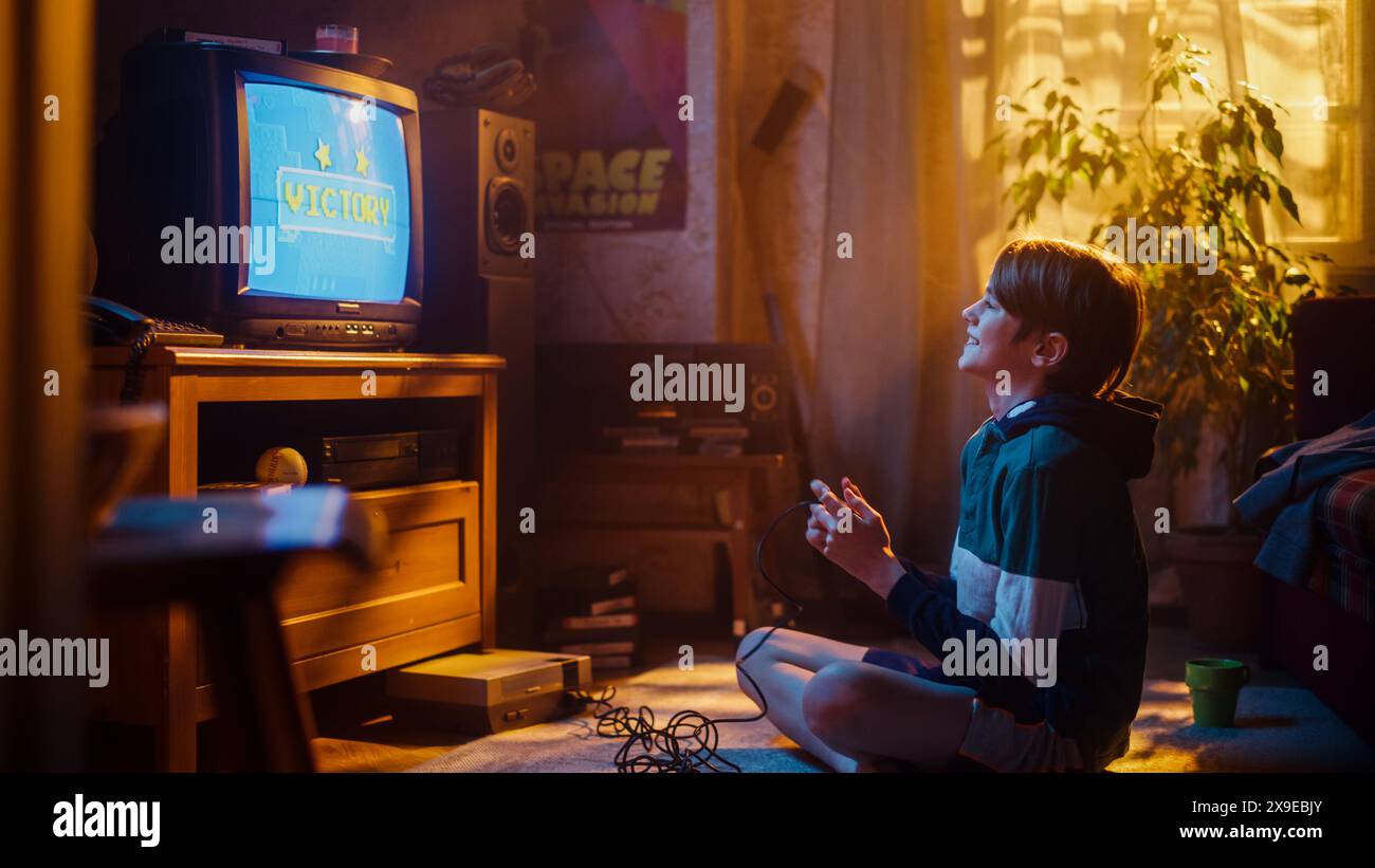 Young Boy Playing Eighties 2D Arcade Space Shooter Game on a Gaming ...