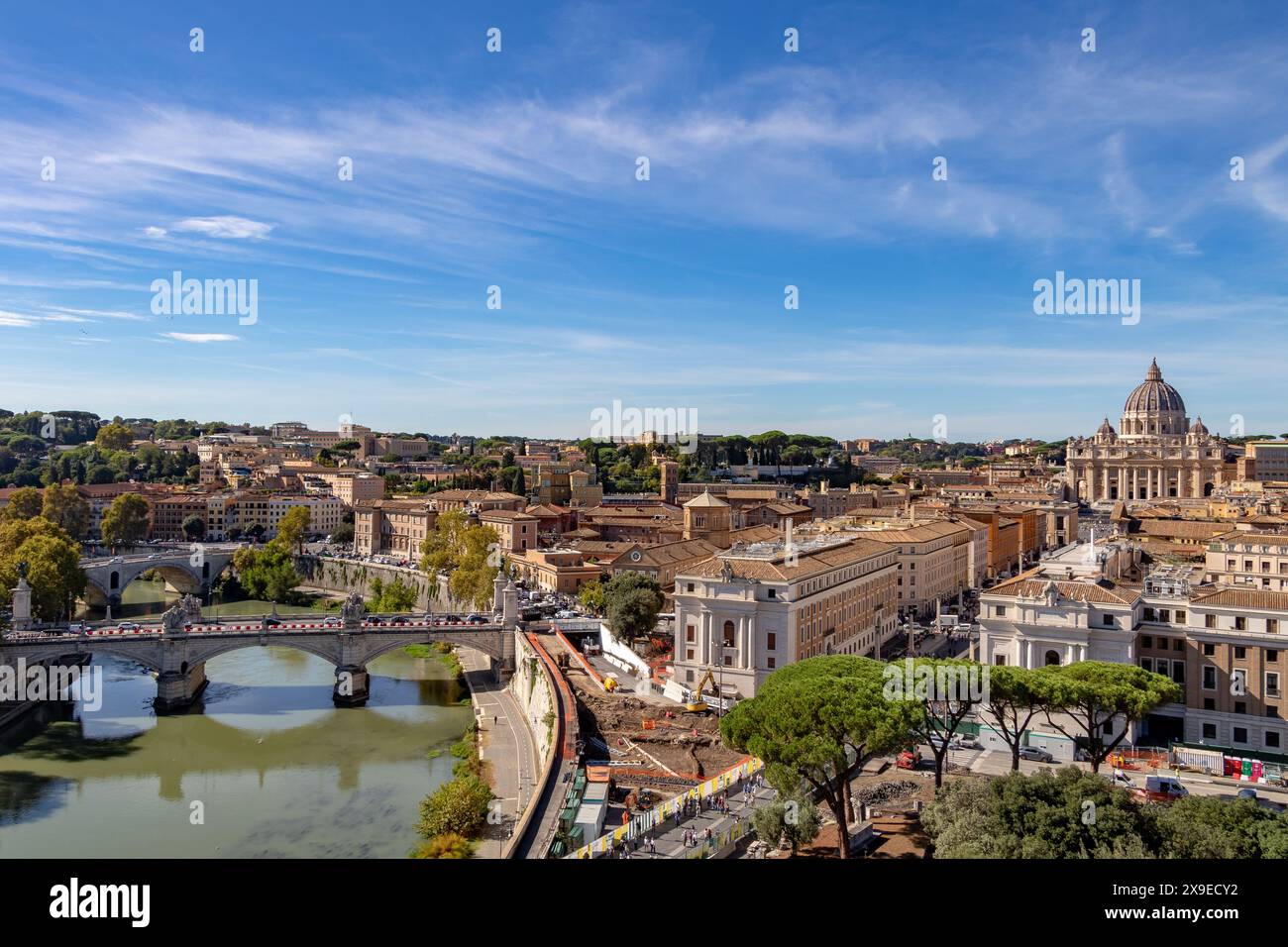 The Dome of St Peter's basilica and bridges spanning the River Tiber ...