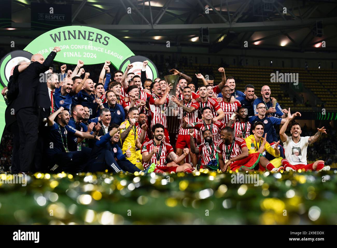 Athens, Greece. 29 May 2024. Players of Olympiacos FC pose with the trophy during the UEFA ...
