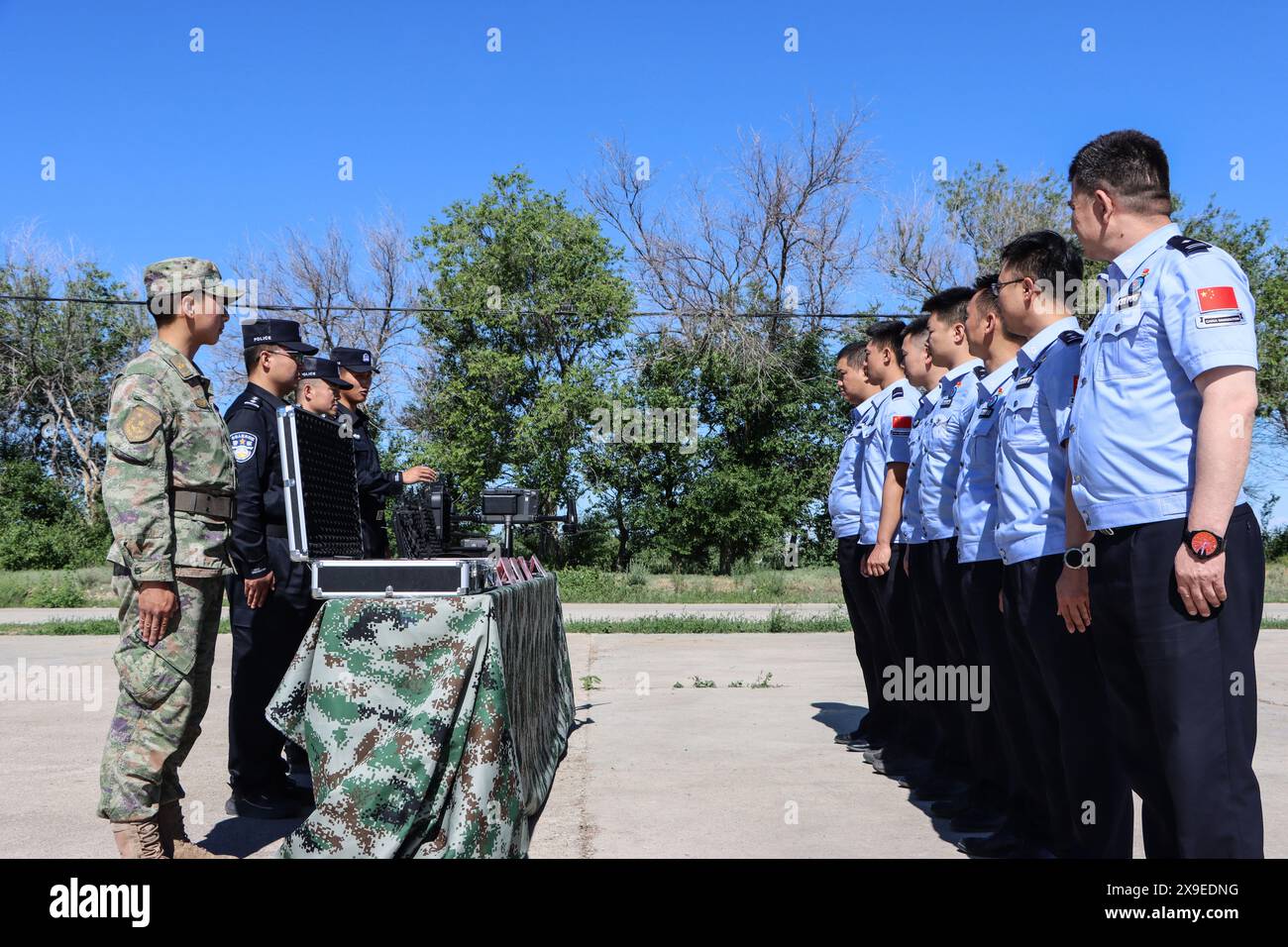 ALTAY, CHINA - MAY 31, 2024 - Border police explain the types of drones ...