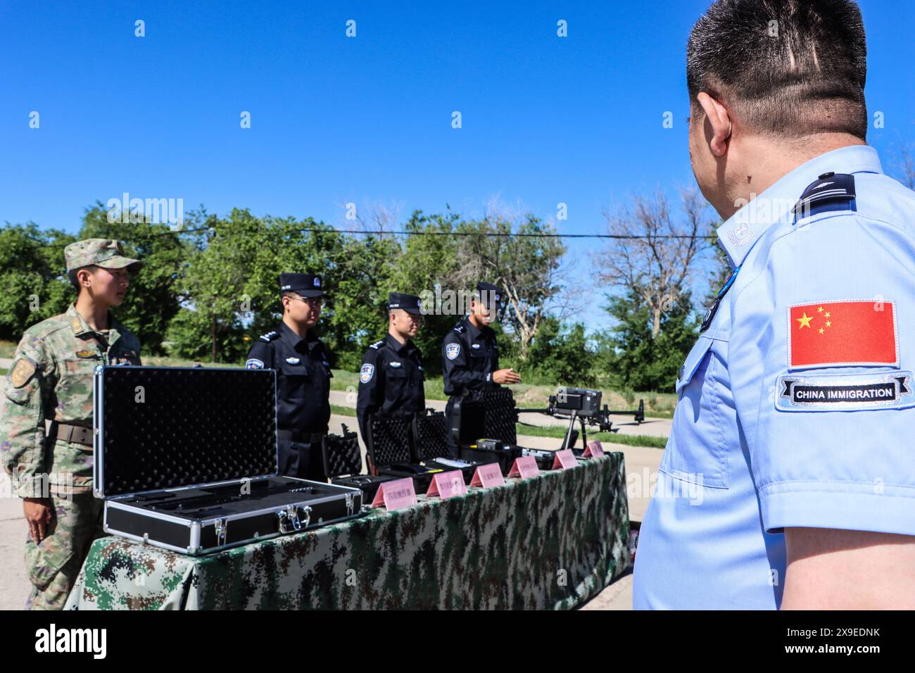 ALTAY, CHINA - MAY 31, 2024 - Border police explain the types of drones ...