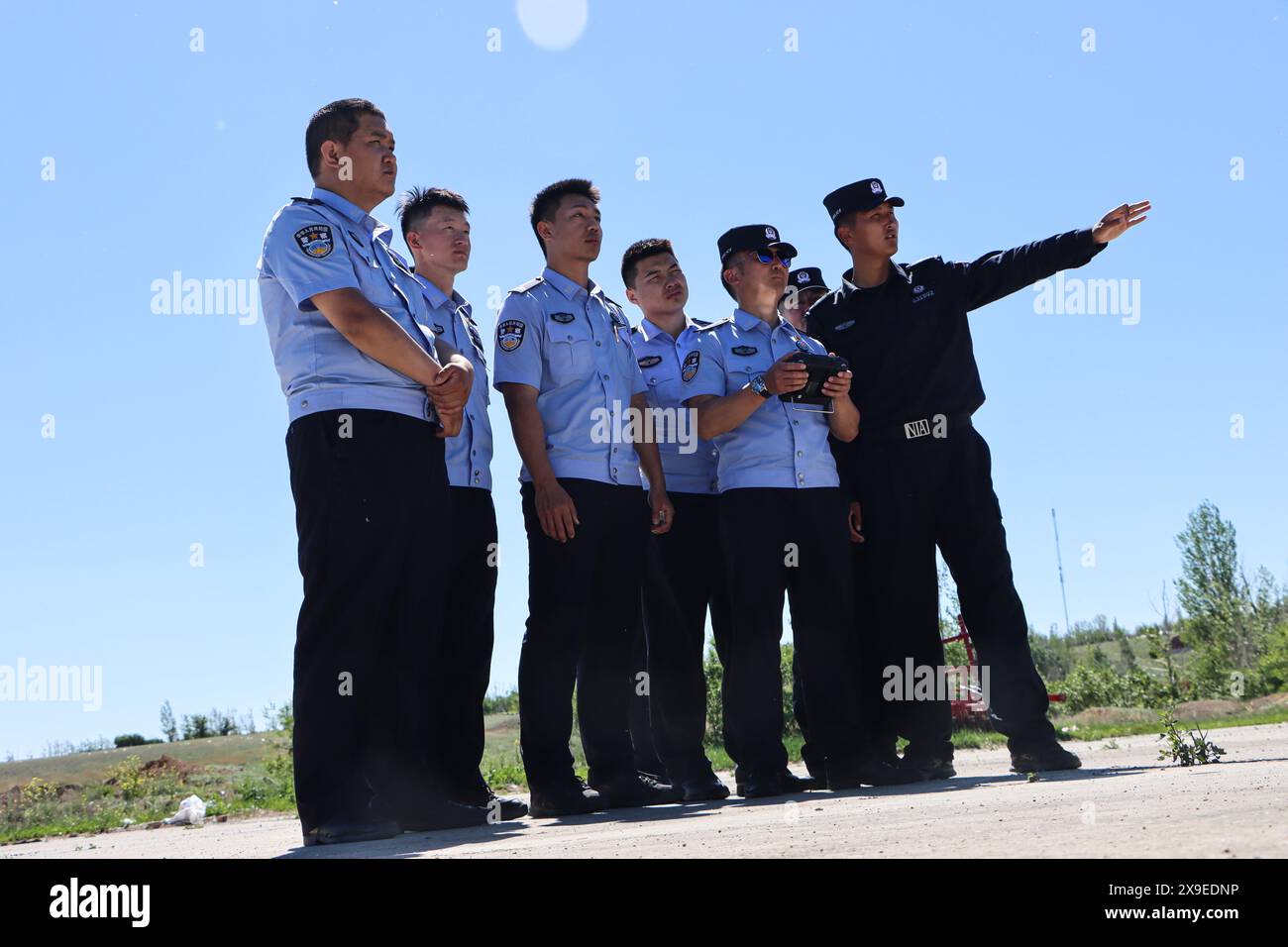ALTAY, CHINA - MAY 31, 2024 - Border police officers fly independently ...