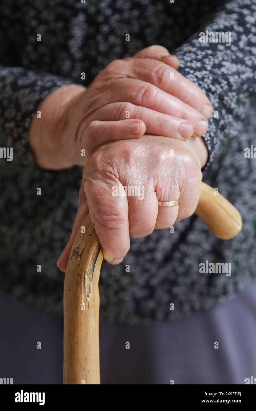 Walking disabilities. Close up of senior disabled woman leaning on her ...