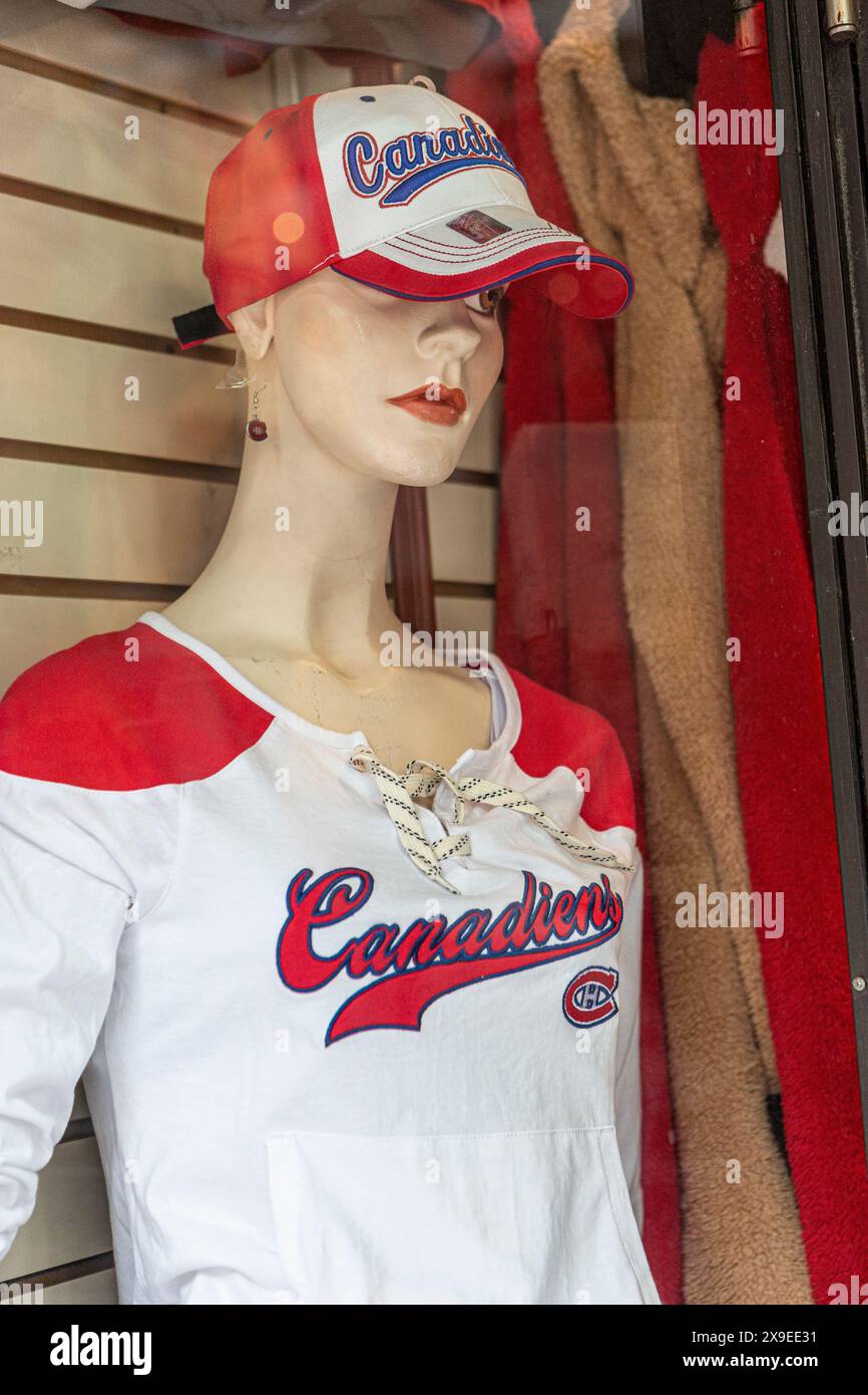 A female mannequin wearing baseball attire in a shop window Stock Photo ...