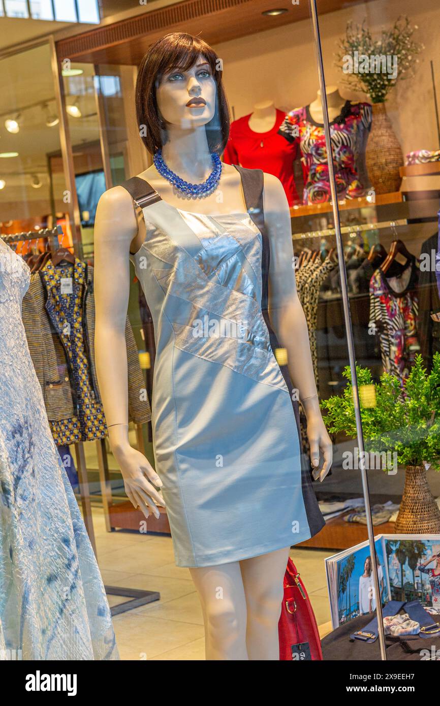 A female fashion mannequin in a shop window display Stock Photo - Alamy