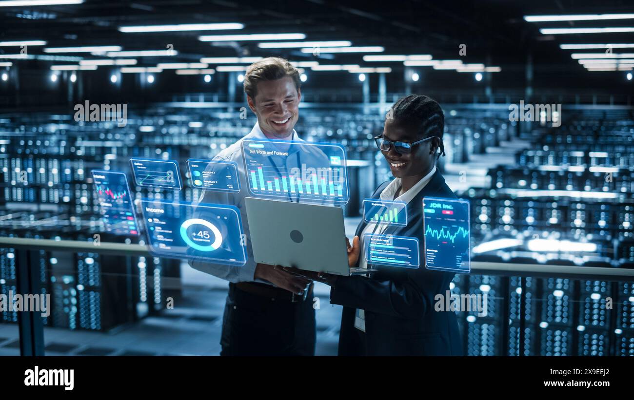 Technical Engineer and Project Administrator Using Computer in Modern Data Center Server Room ...