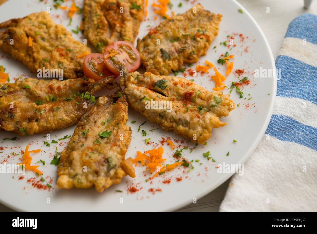 Tapa of anchovies battered with flour and egg in a Spanish restaurant ...