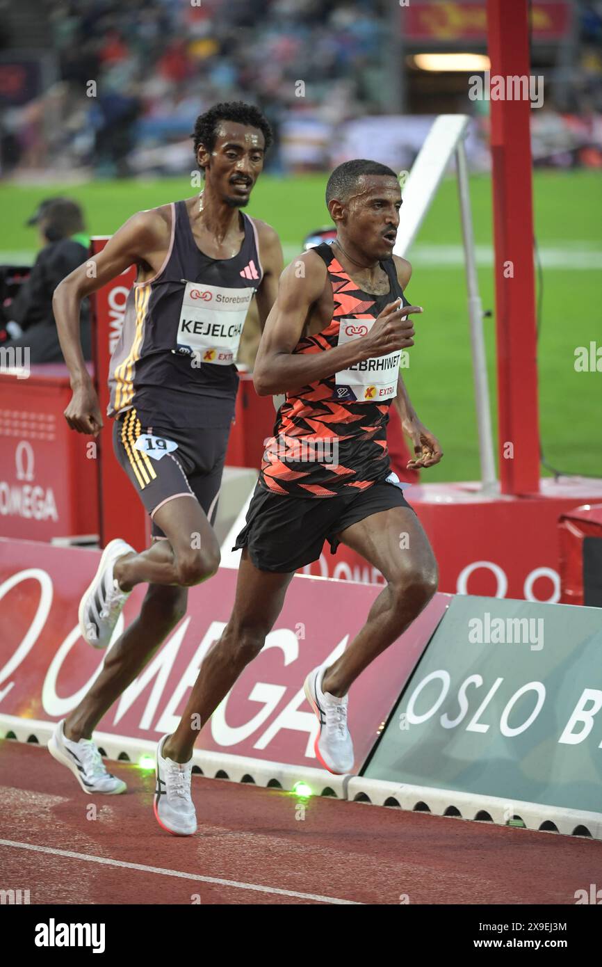 Hagos Gebrhiwet and Yomif Kejelcha of Ethiopia competing in the men’s ...