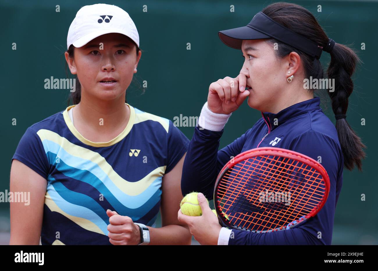 Paris, France. 31st May, 2024. Zhu Lin (R)/Wu Fang-Hsien react during ...