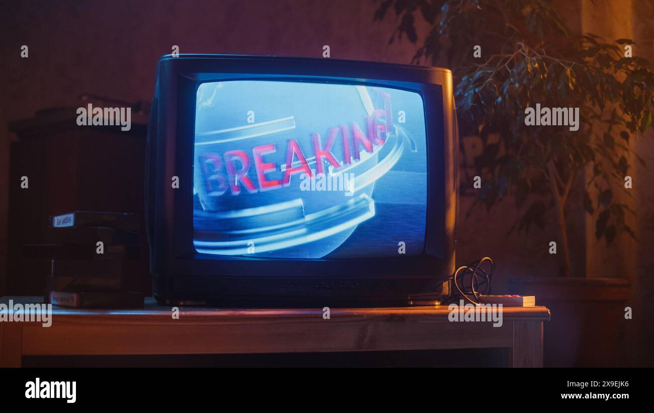Close Up Footage of a Dated TV Set Screen: Breaking News Report. Intro ...