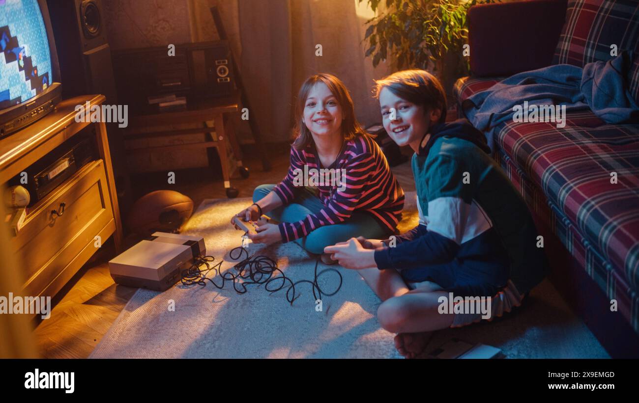 Home Video Concept: Young Brother and Sister Playing Old-School Arcade ...