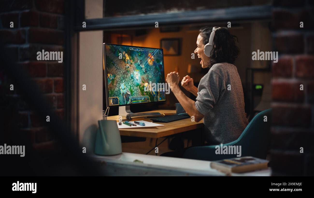 Cheerful Female Gamer Playing Online Video Game on Personal Computer ...