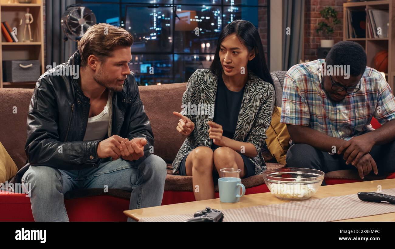 Television Sitcom Concept. Three Diverse Friends having a Chat in the ...