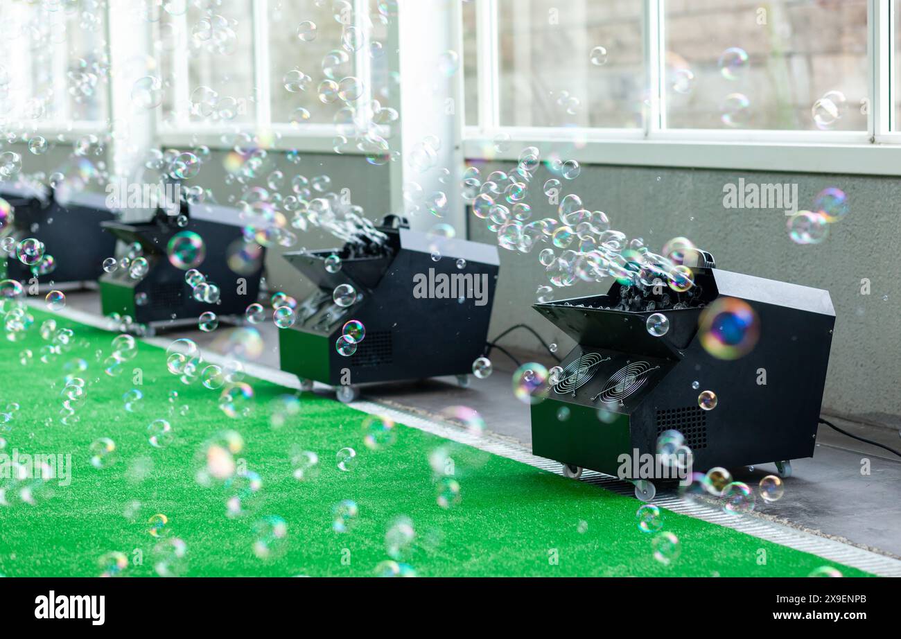 Bubble machine hi-res stock photography and images - Alamy