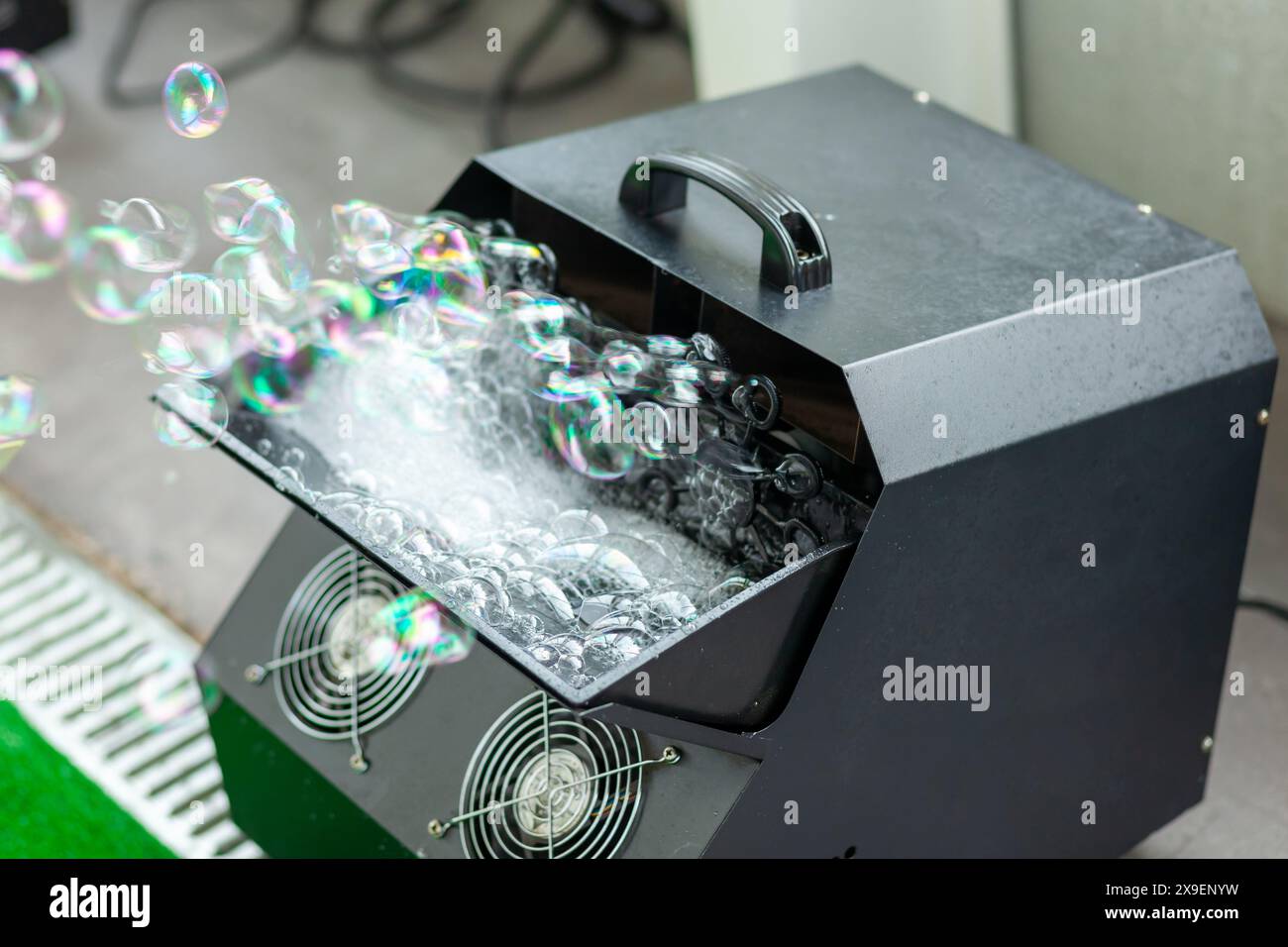 Bubble machine used for events and parties Stock Photo - Alamy