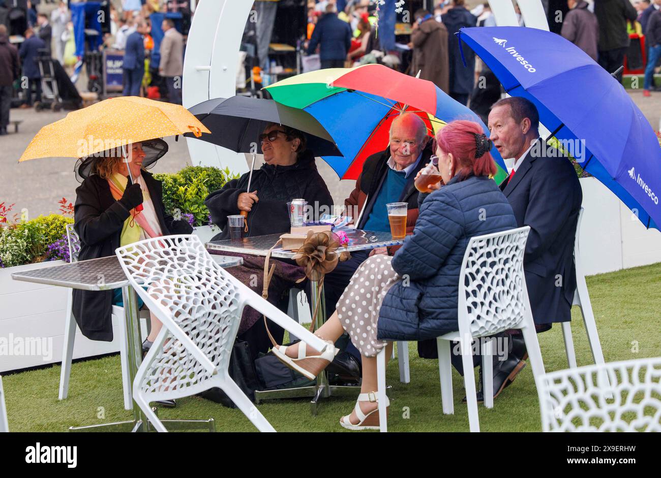 Epsom, UK. 31st May, 2024. Ladies Day at Epsom. Blustery conditions on ...