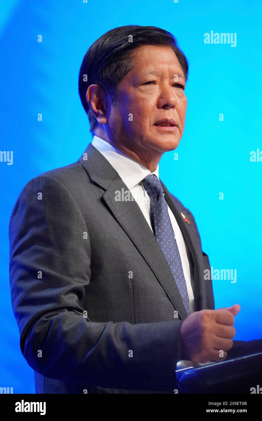 Philippine President Ferdinand Marcos Jr. delivers his opening speech ...