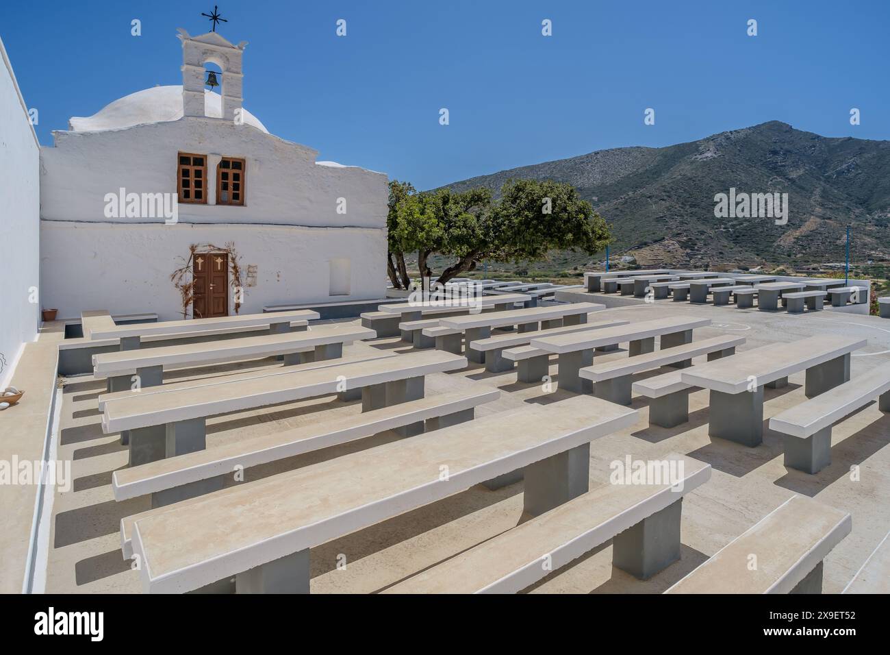 View of the church Agia Theodoti in Ios Greece, where locals hold a ...