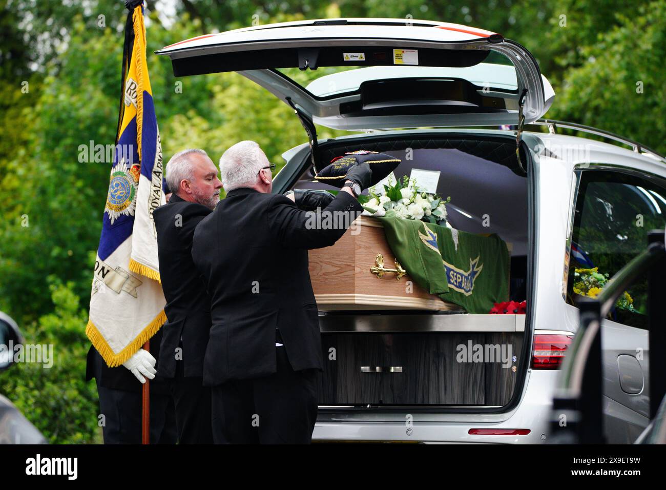 The coffin of D-Day veteran Albert Price, 98, from Solihull, is carried ...