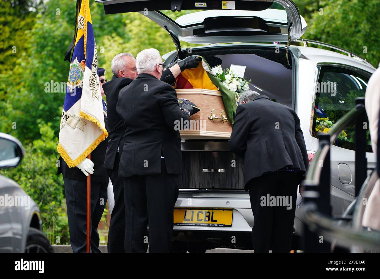The coffin of D-Day veteran Albert Price, 98, from Solihull, is carried ...