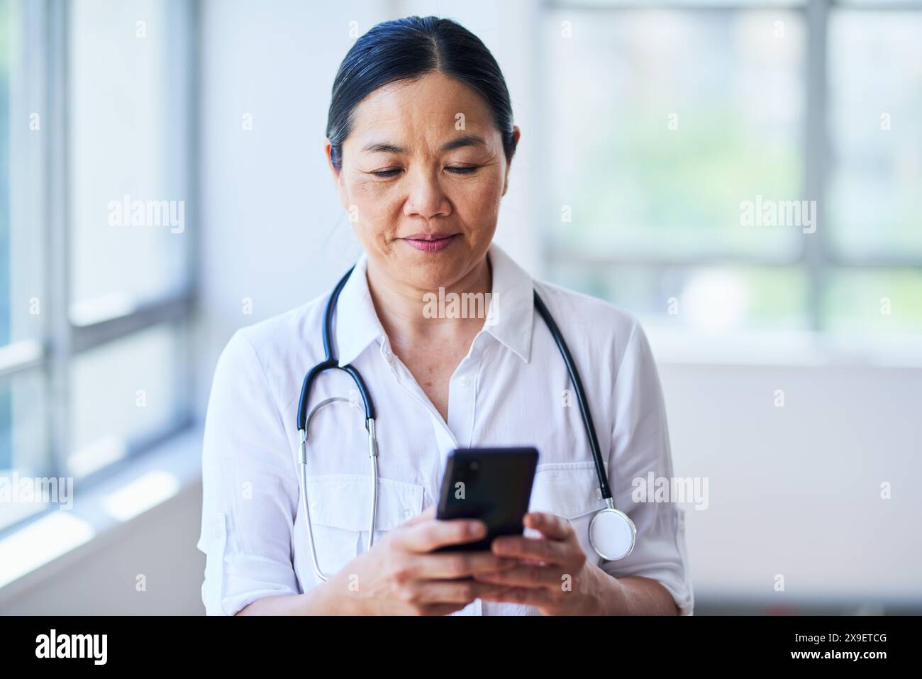 Competent doctor using modern hi-res stock photography and images - Alamy