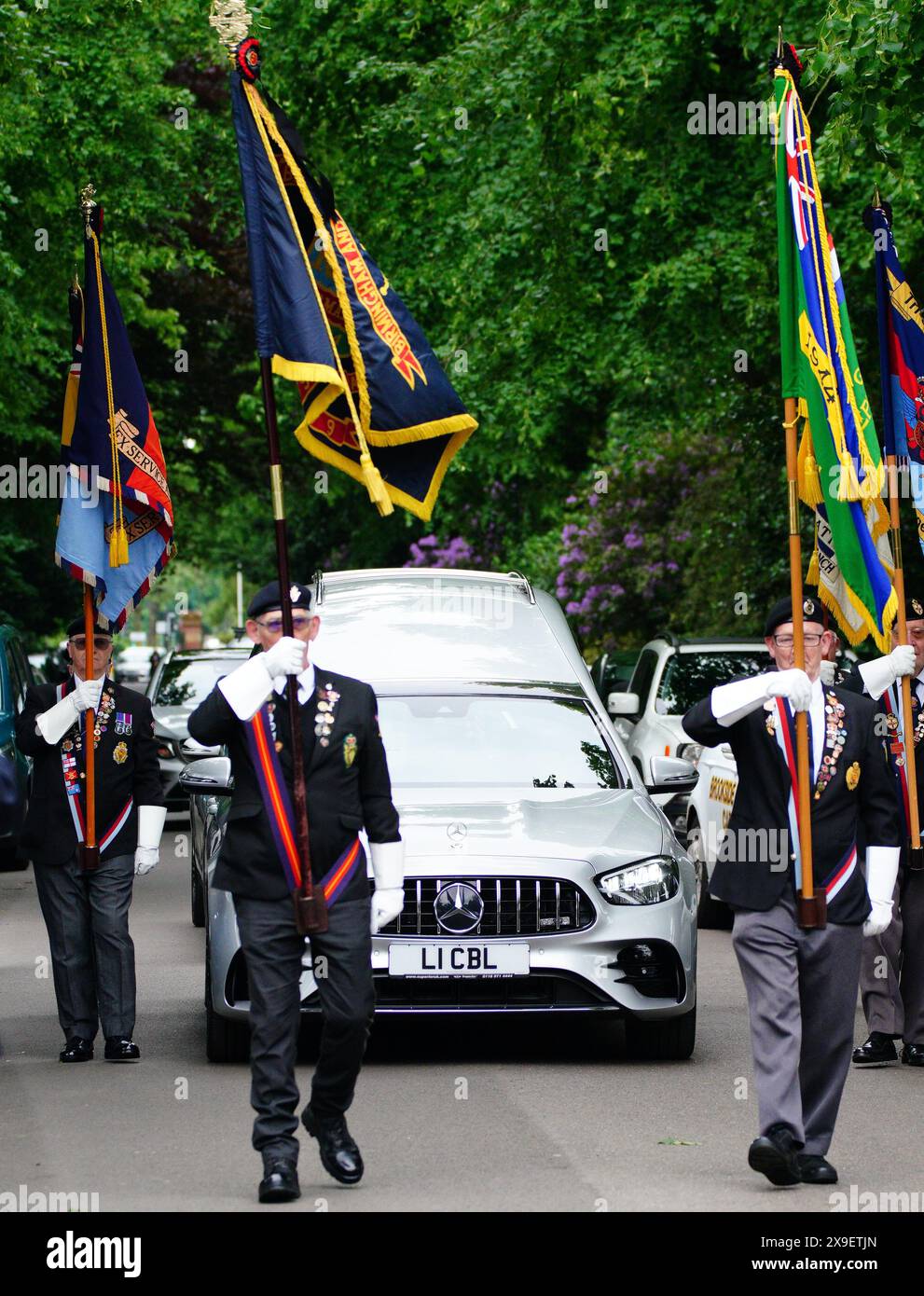 Standard bearers escort the hearse into the funeral of D-Day veteran ...