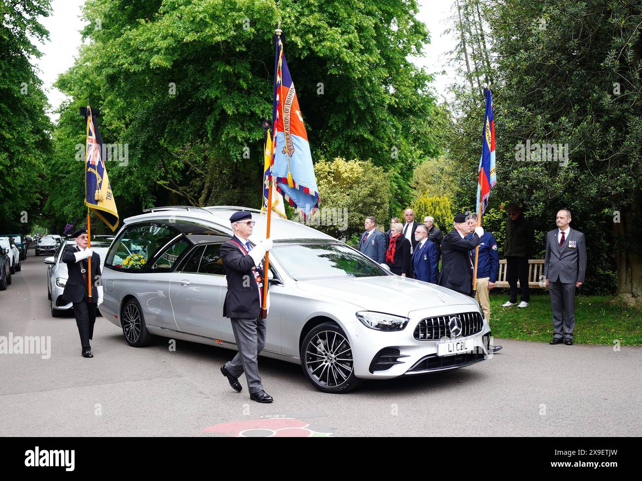 Standard bearers escort the hearse into the funeral of D-Day veteran ...