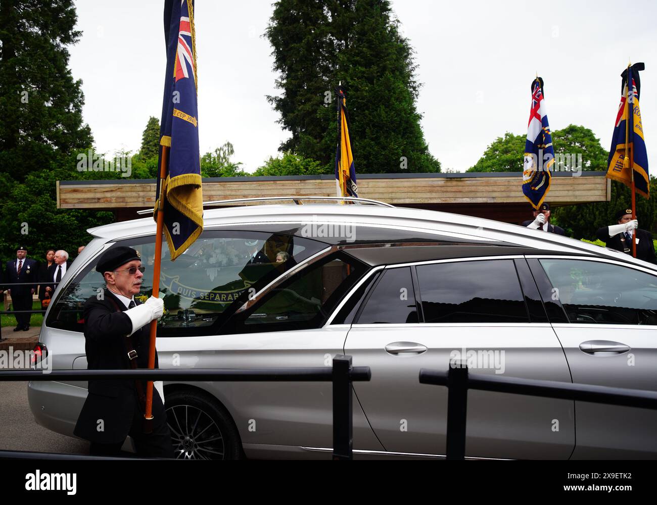 Standard bearers escort the hearse into the funeral of D-Day veteran ...