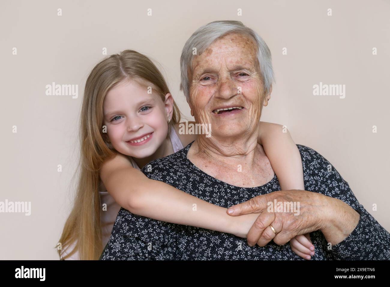 Happy family, child and great grandma hug, relax, smile, love and bond ...