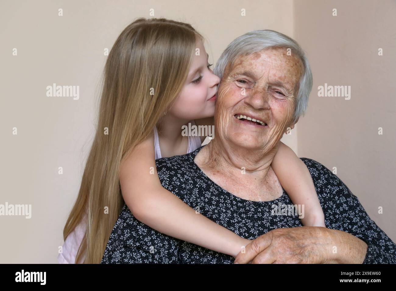 Happy family, child and great grandma hug, relax, smile, love and bond ...