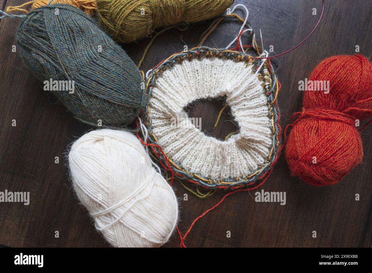 Flat lay photography of Fair Isle knitting project on the needles in ...