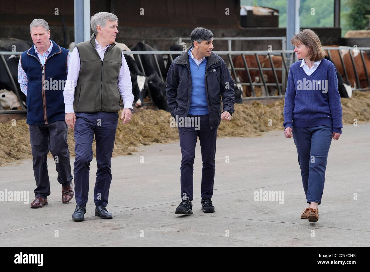 (left to right) Farm owner Mike Rowlinson, Prime Minister Rishi Sunak ...