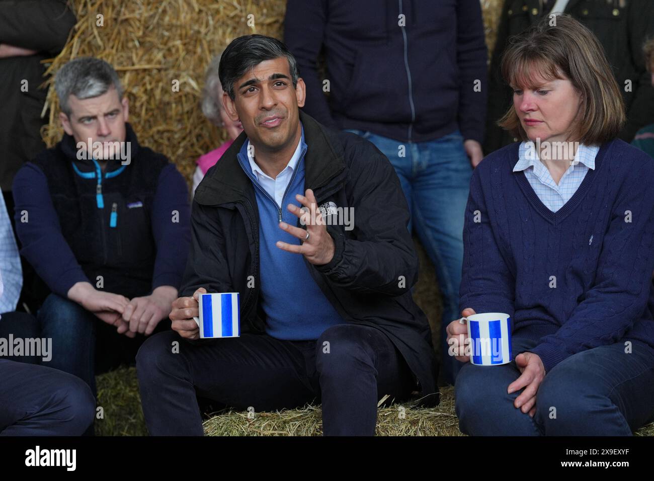 Prime Minister Rishi Sunak, with farm owner Rachel Rowlinson (right ...