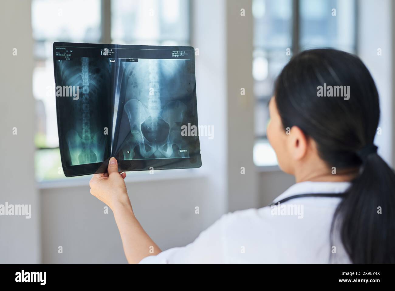 Doctor Analyzing X-Ray Imaging in Hospital for Accurate Diagnosis Stock ...
