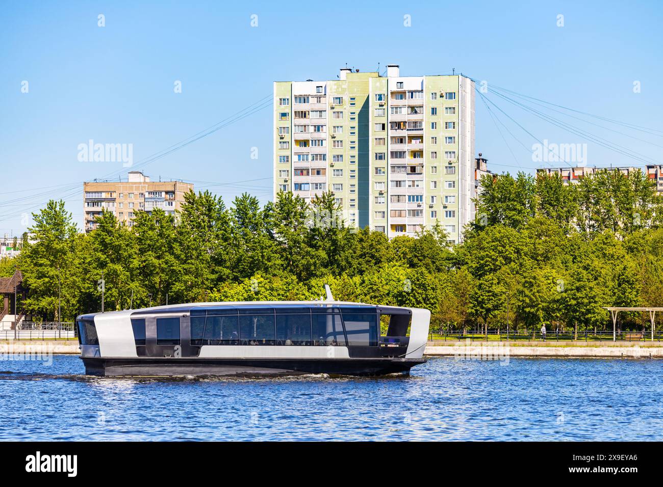 Moscow, Russia - May 22, 2024: a water bus floats along the river ...