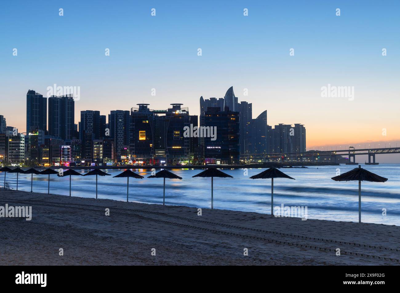 Gwangalli Beach and Gwangan Bridge at dawn, Busan, South Korea Stock ...