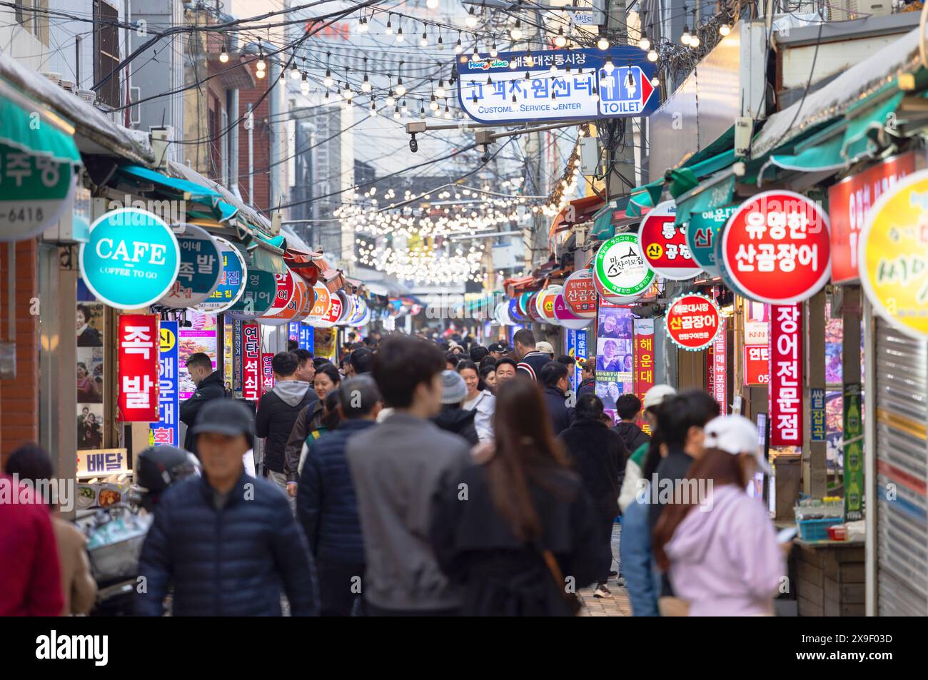 People walking along food street, Haeundae Beach, Busan, South Korea ...