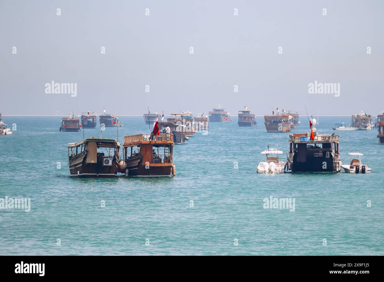 Ships in the bay of the Persian Gulf, near the Katara area in Doha ...
