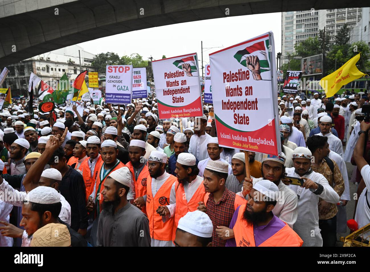 Activists of Islami Andolan Bangladesh staged a mass procession demanding stop genocide and free ...