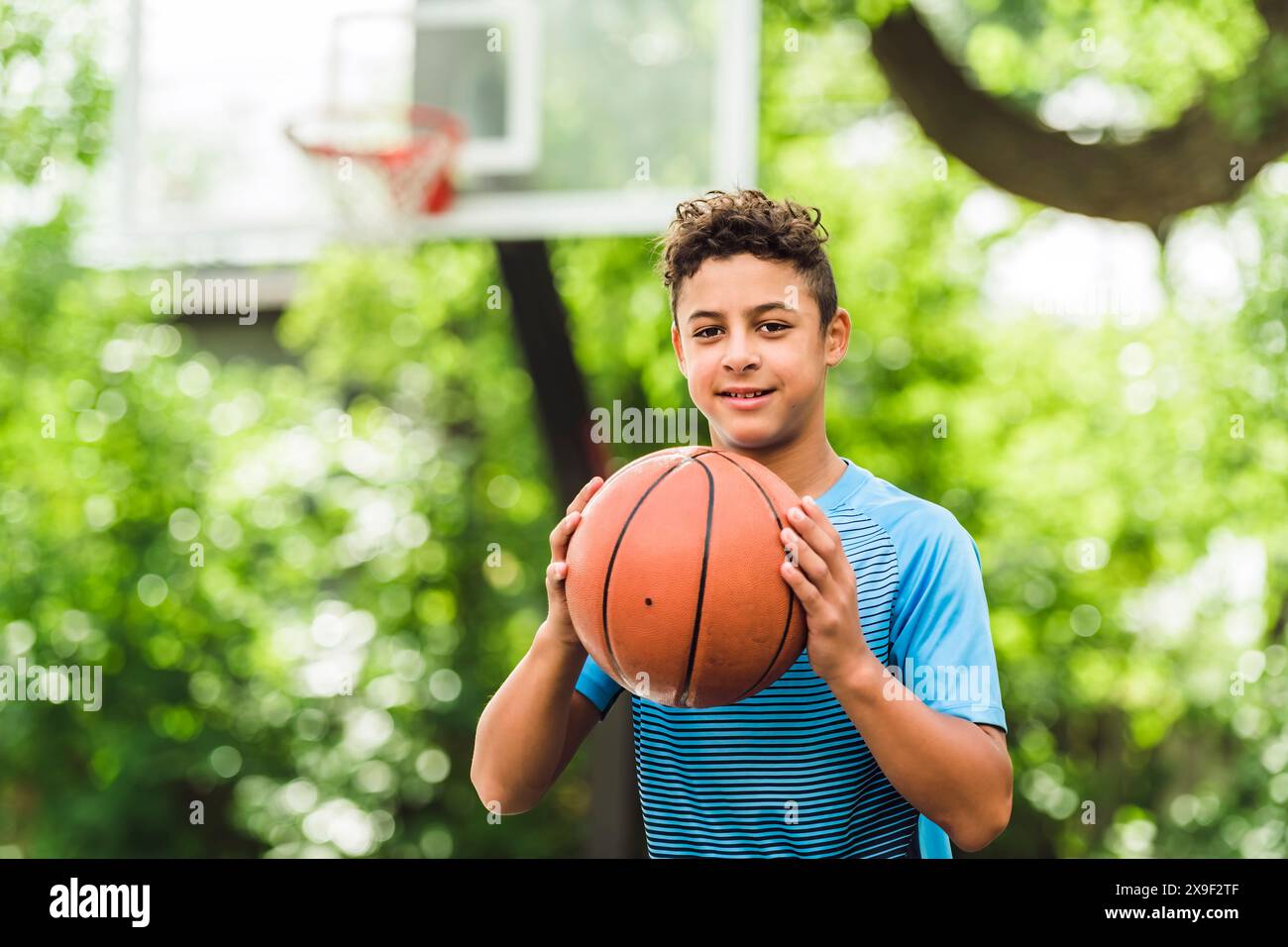 teen boy play basketball on summer season Stock Photo - Alamy