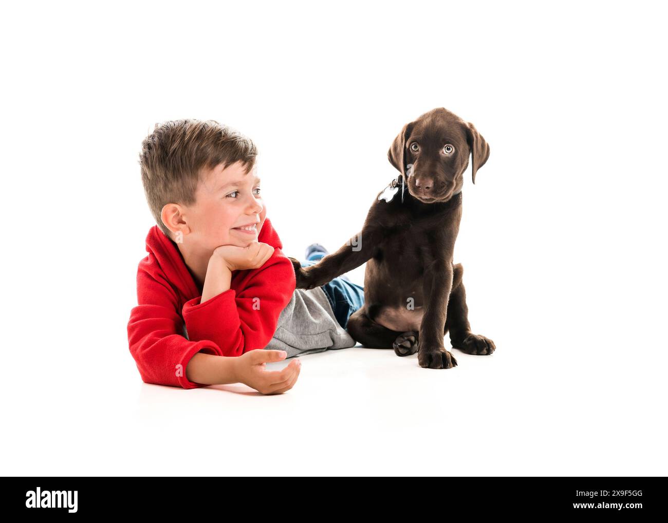 cute five year old boy studio portrait on white background with his ...