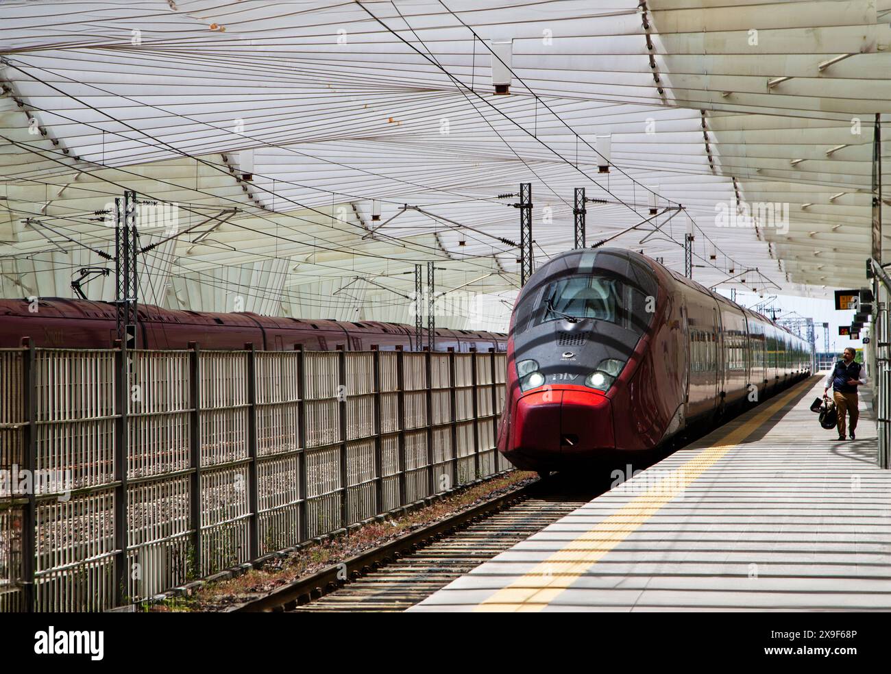 High-speed train enters Reggio Emilia AV Mediopadana Station, advanced ...