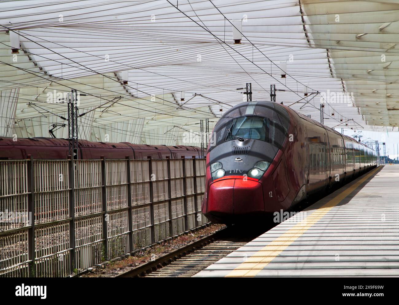 High-speed train enters Reggio Emilia AV Mediopadana Station, advanced ...