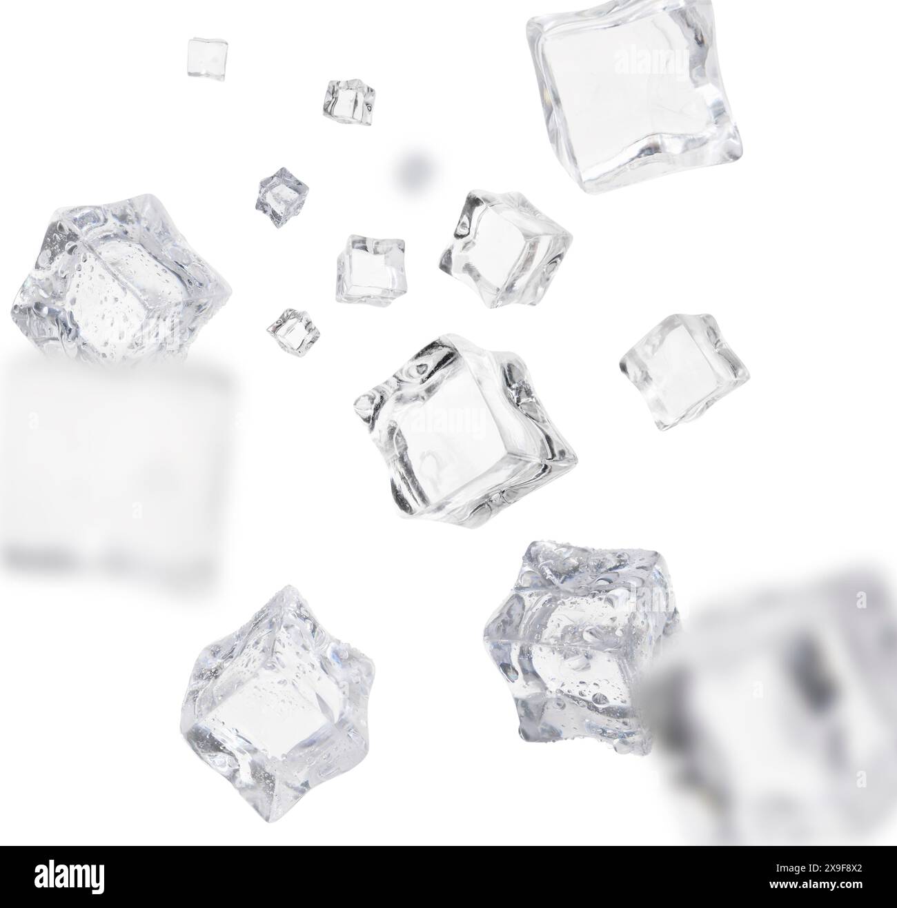 Many ice cubes in air on white background Stock Photo - Alamy