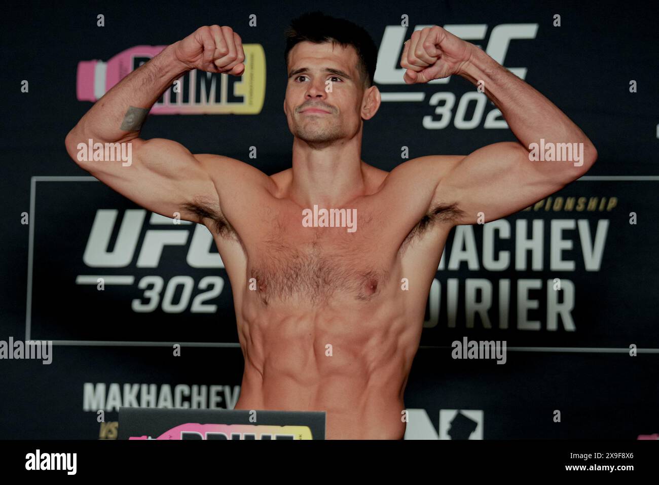 NEWARK, NJ - MAY 31: Micky Gall poses on the scale during the UFC 302 ...
