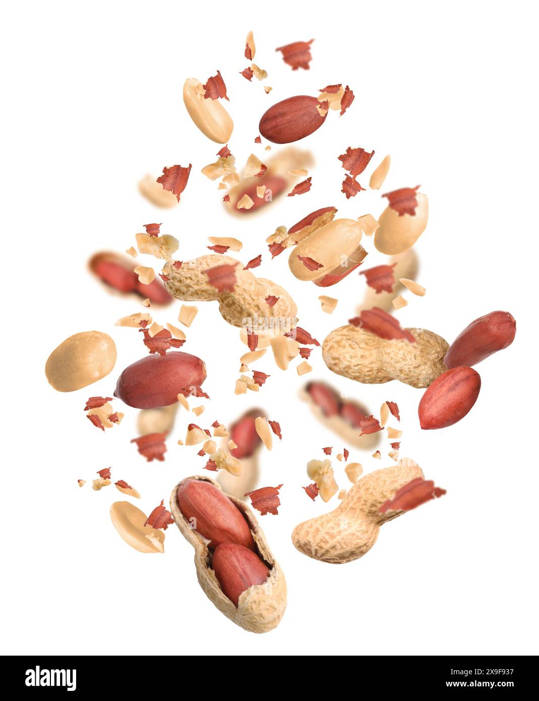 Unpeeled peanuts in air on white background Stock Photo - Alamy