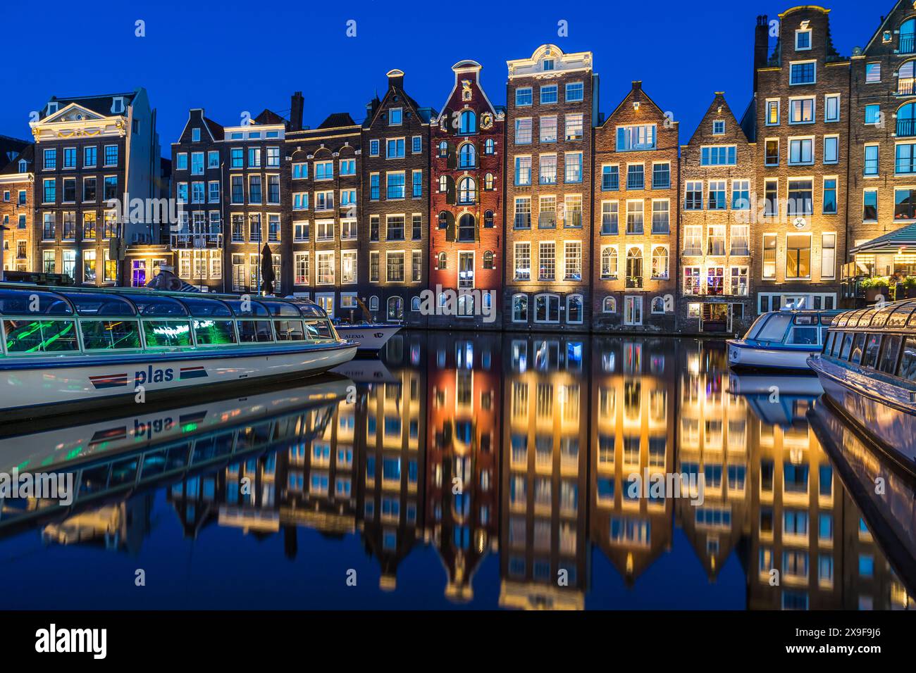 The charming and uneven gingerbread houses at Damrak pictured at ...